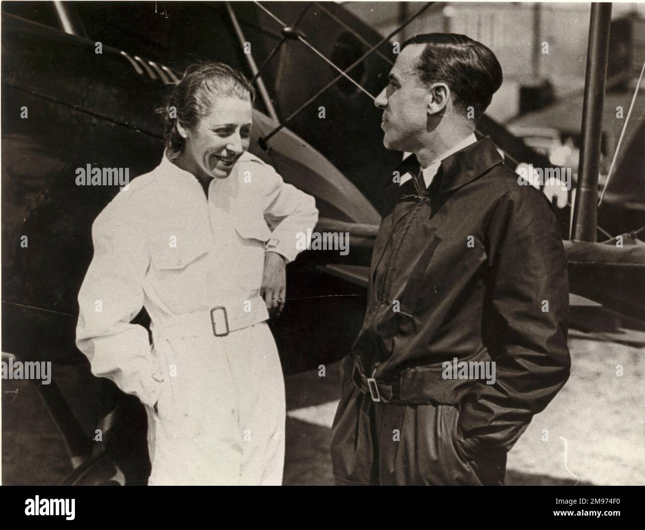 Amy with her husband, Jim Mollison, alongside their de Havilland Dragon ...