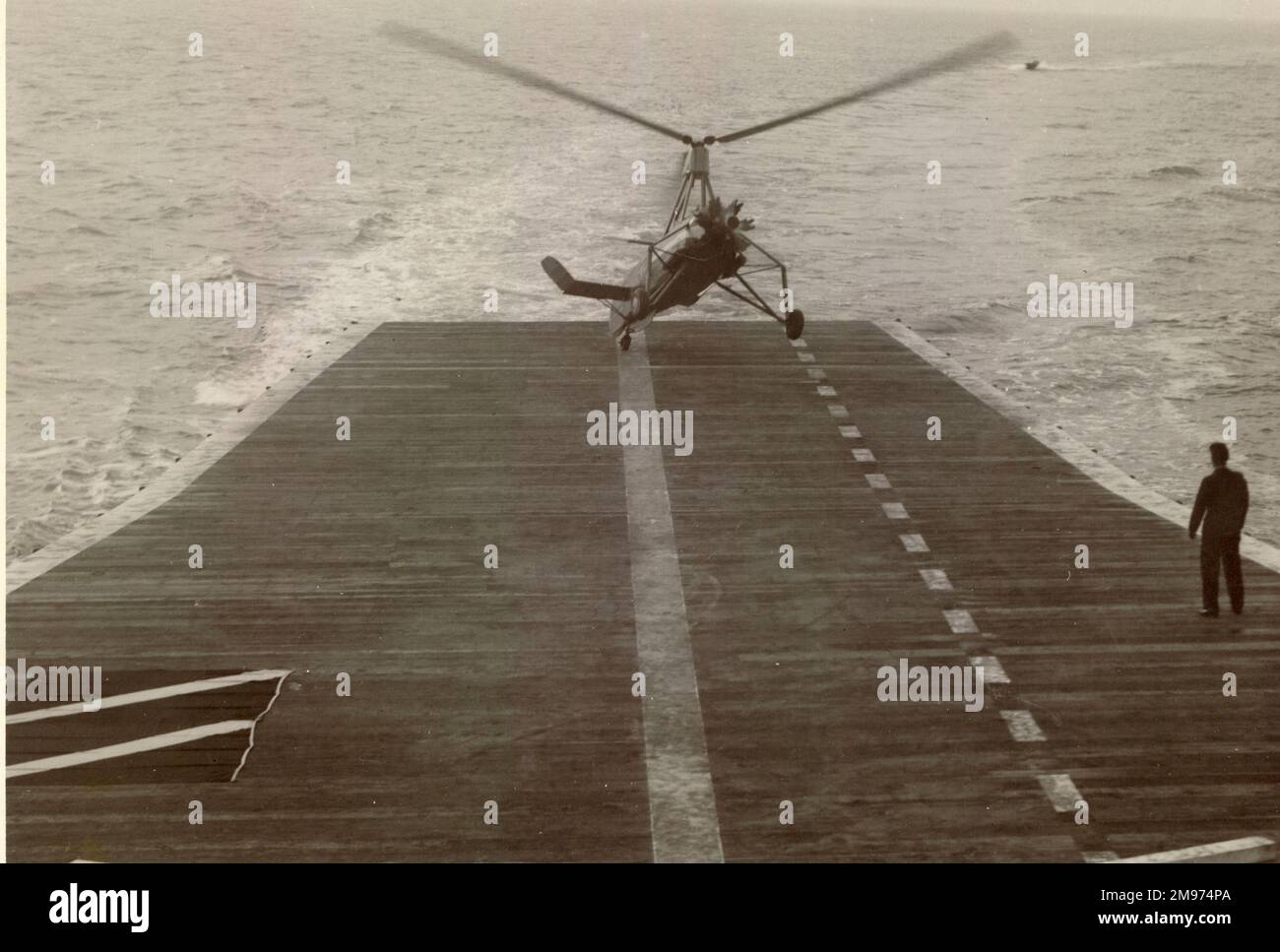 Cierva C30 landing on the deck of the Italian cruiser Fiume Stock Photo ...