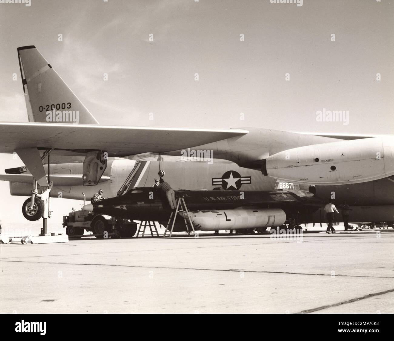 North American X-15, 56-6671, being winched into place under the Boeing ...