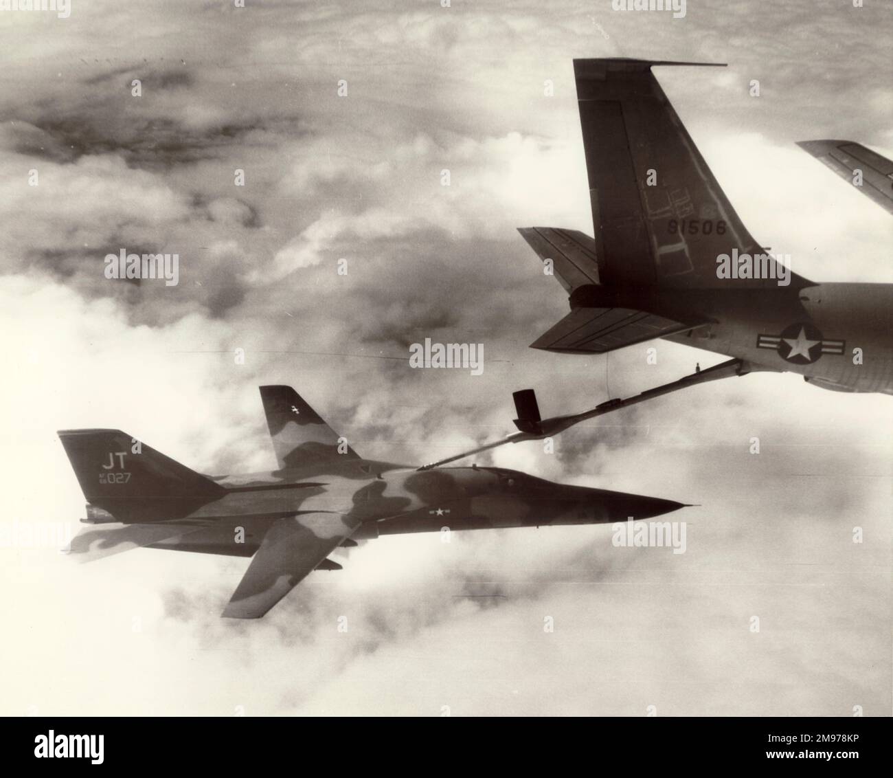 A USAF General Dynamics F-111E, 68-027 refuels from a Boeing KC-135 ...