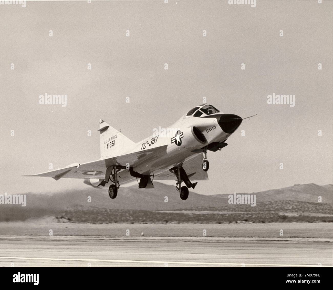 The first flight of the Convair TF-102A Delta Dagger, 54-1351, 8 ...