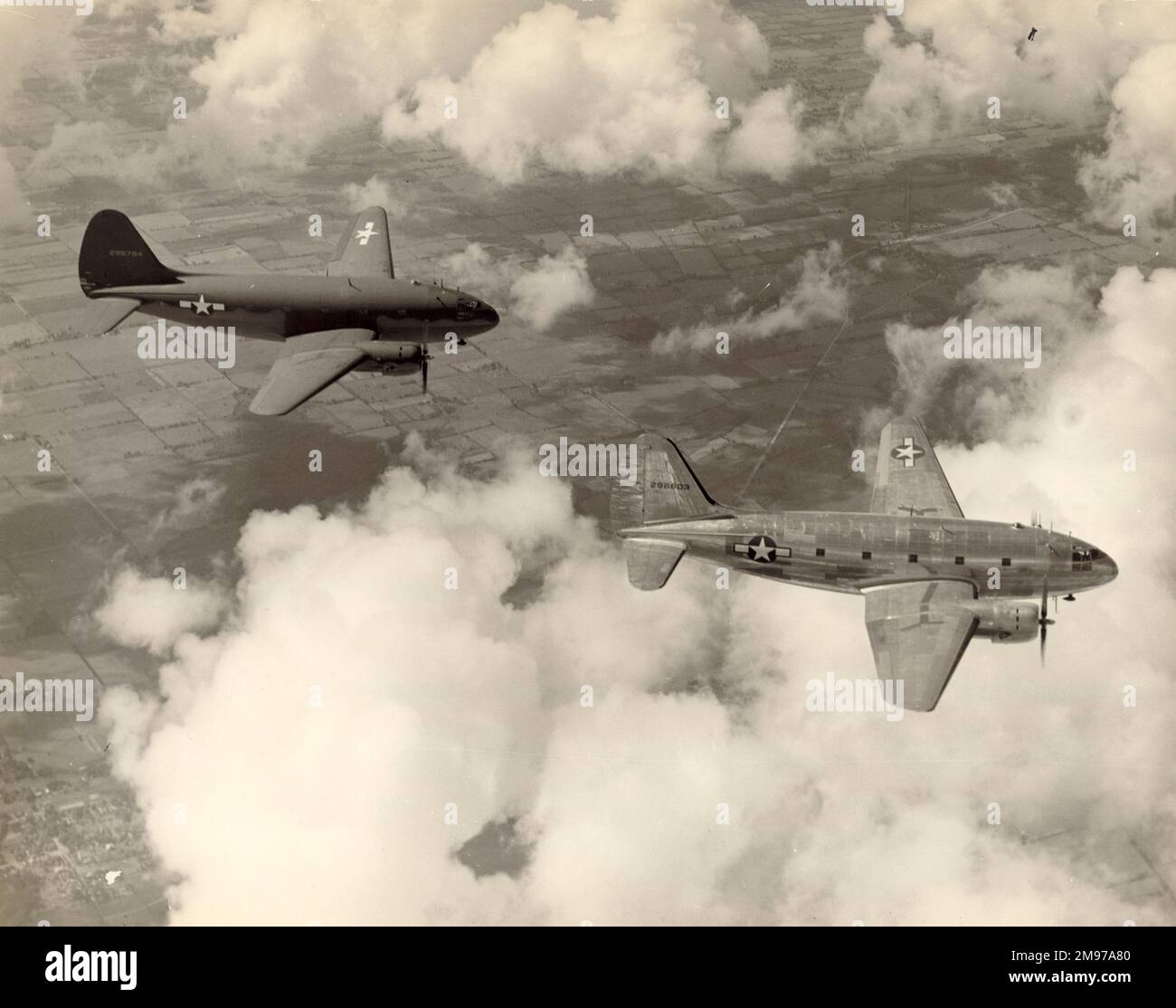 Two Curtiss C-46A-CU Commandos, 42-96803 and 42-96784. circa 1944 Stock ...