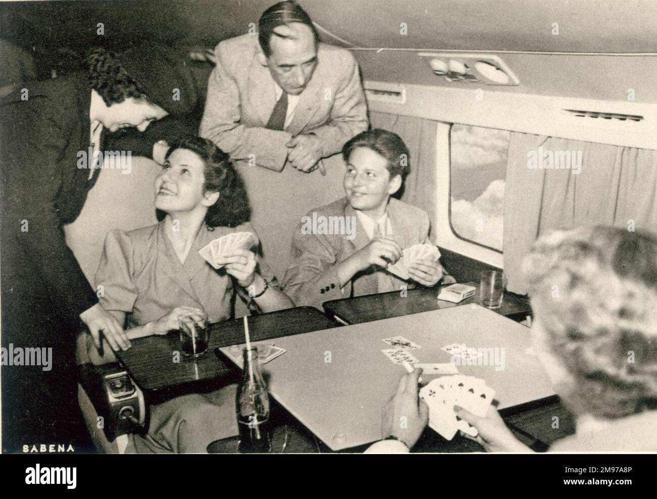 Passengers aboard a Sabena Douglas DC-6 Stock Photo - Alamy