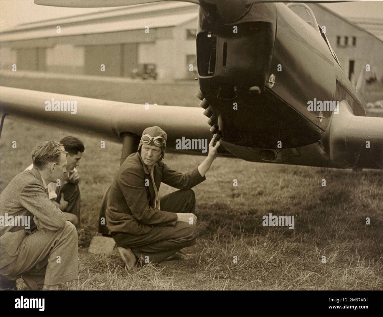 Charles A. Lindbergh inspects his Miles M12 Mohawk, G-AEKW Stock Photo ...