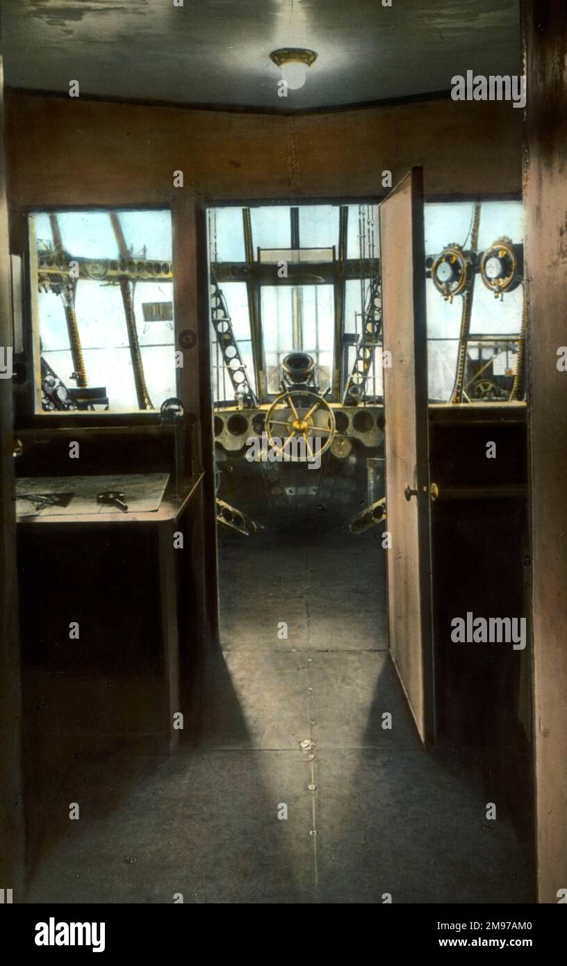 Looking through the navigation room into the control cabin aboard the Graf Zeppelin, LZ 127 ...