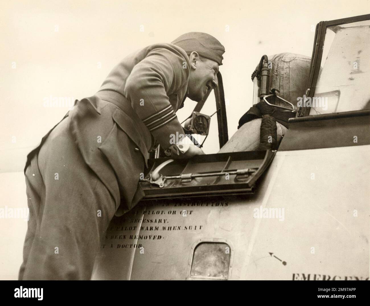 Flt Lt M.J. Adam in the cockpit of the Bristol 138A, K4879, receiving ...