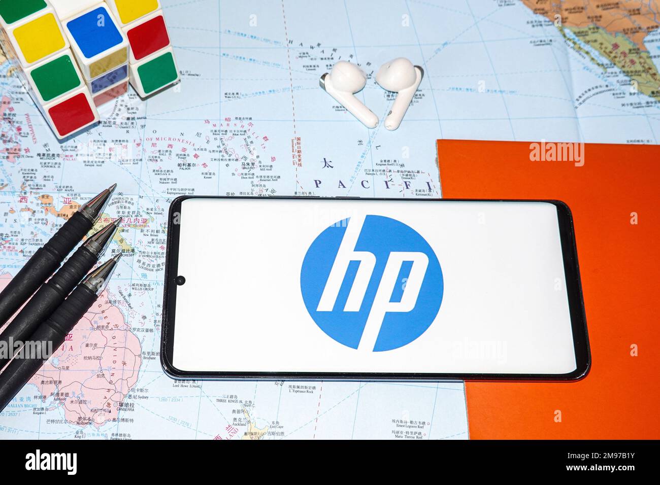 In this photo illustration, a HP logo is displayed on the screen of a ...