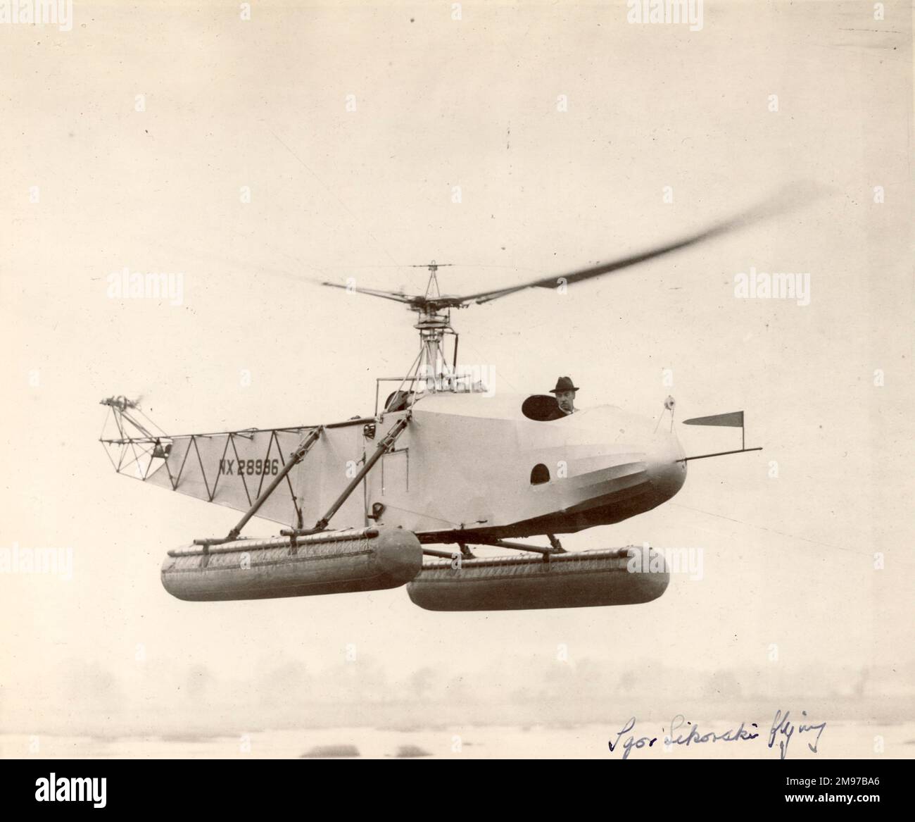 Igor Sikorsky at the controls of the Sikorsky VS-300. 17 April 1941 ...