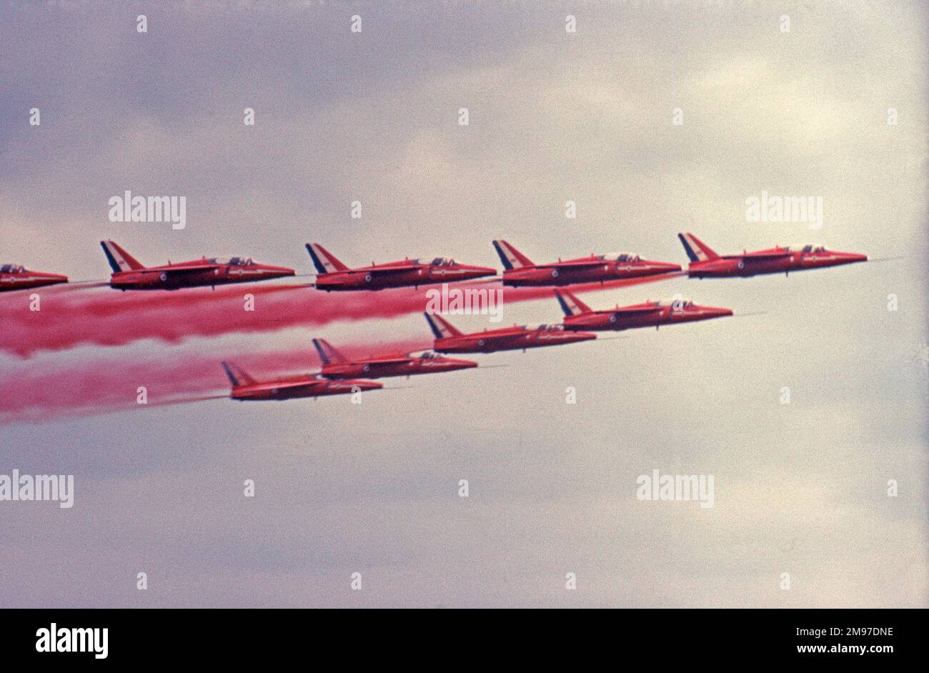 RAFAT RAF Red Arrows Folland Gnats close formation with red smoke Stock ...