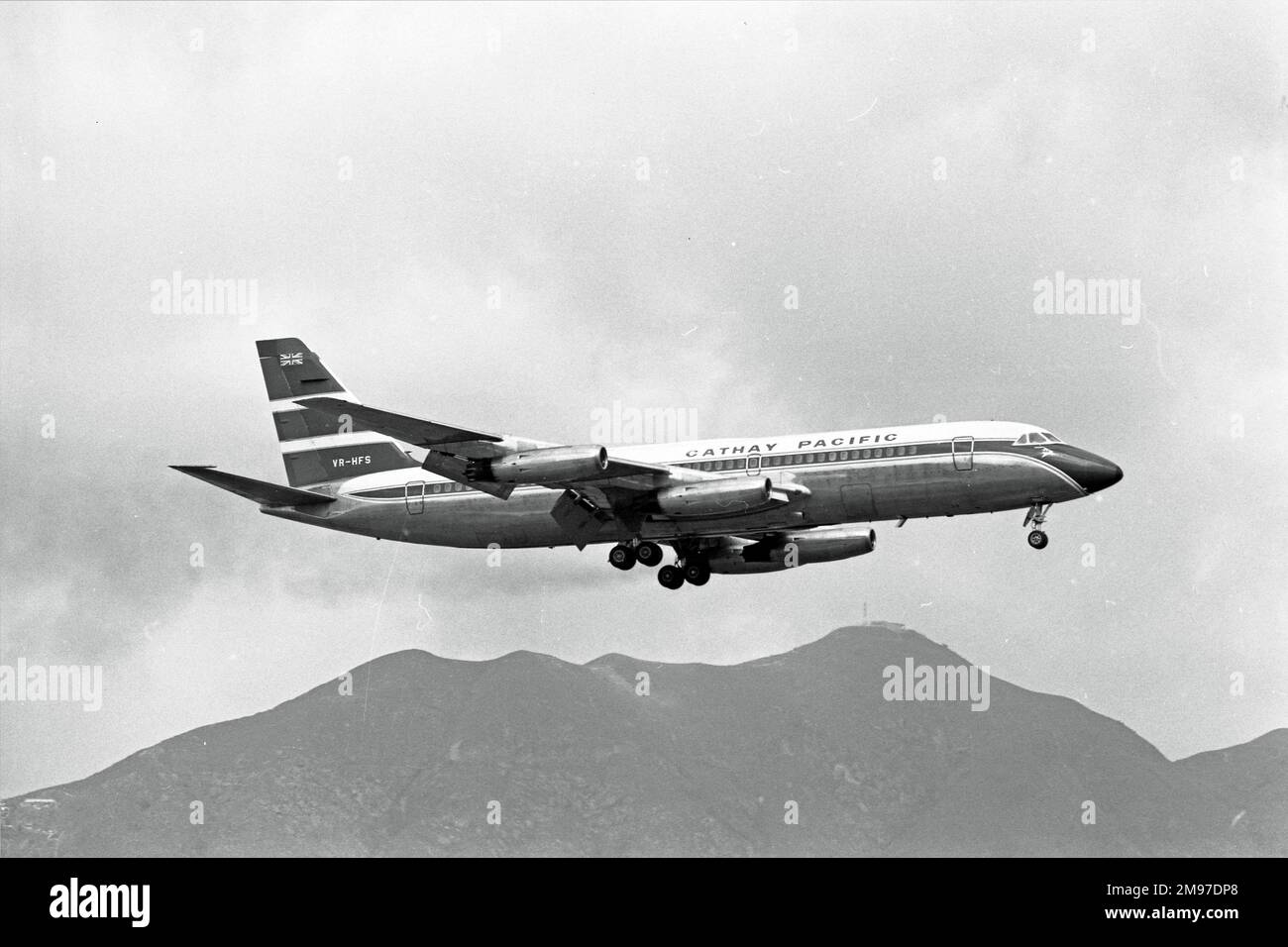 Convair CV880M VR-HFS of Cathay Pacific landing at Hong Kong on 20 ...