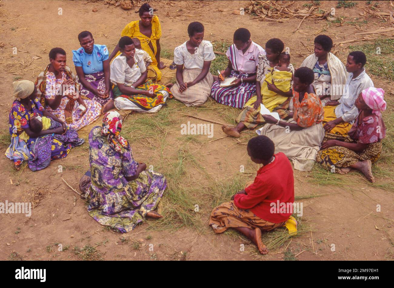 Uganda, Group of women are gathered outside to get informed Stock Photo ...