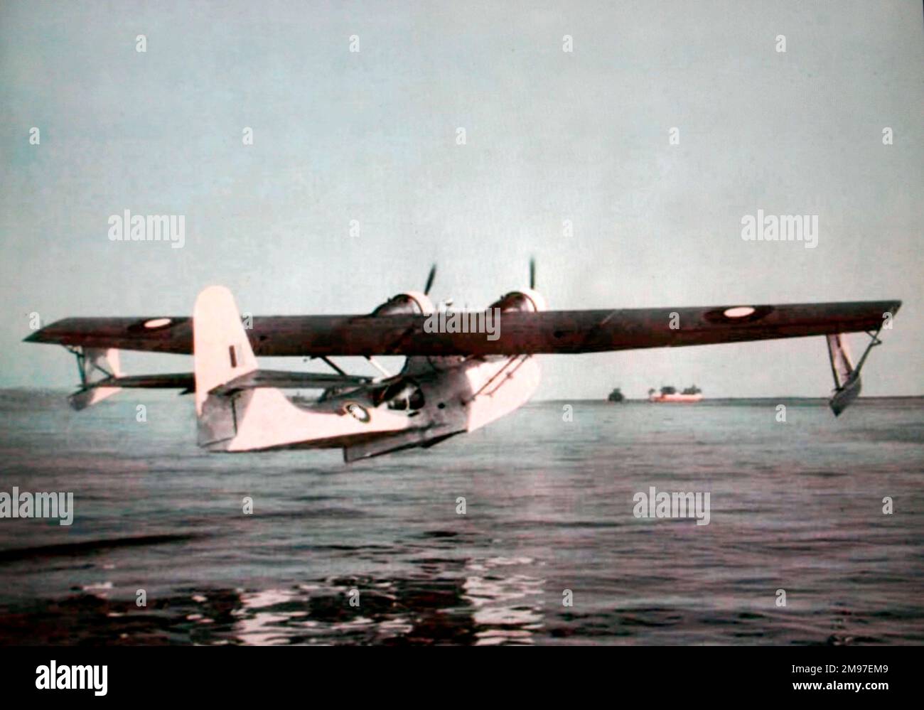 Consolidated PBY Catalina (aft) climbing away of Boeing built PB2B-2 ...