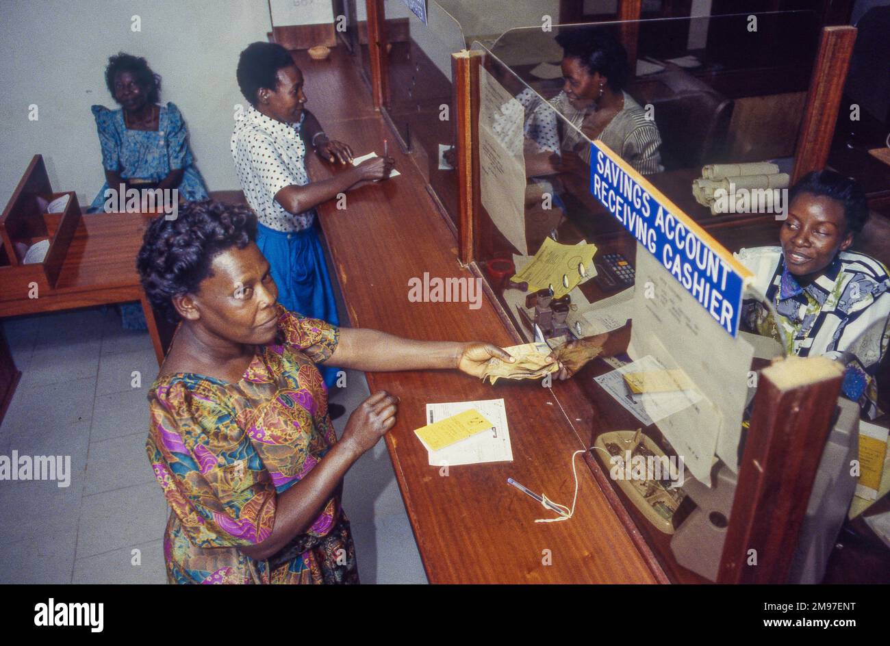 Woman cashier bank hi-res stock photography and images - Alamy