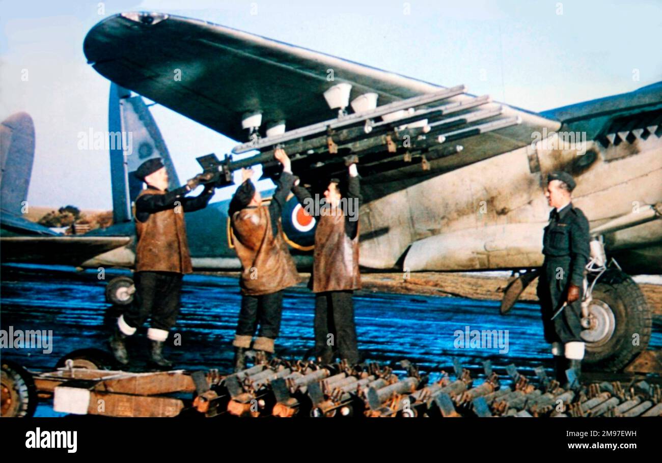 De Havilland DH98 Mosquito FBIV being armed with 3-inch rocket ...