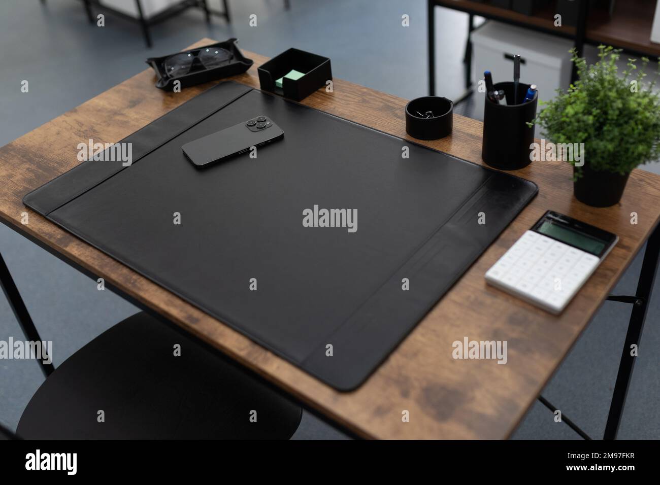 manager's desk with leather pad and stationery accessories Stock Photo ...