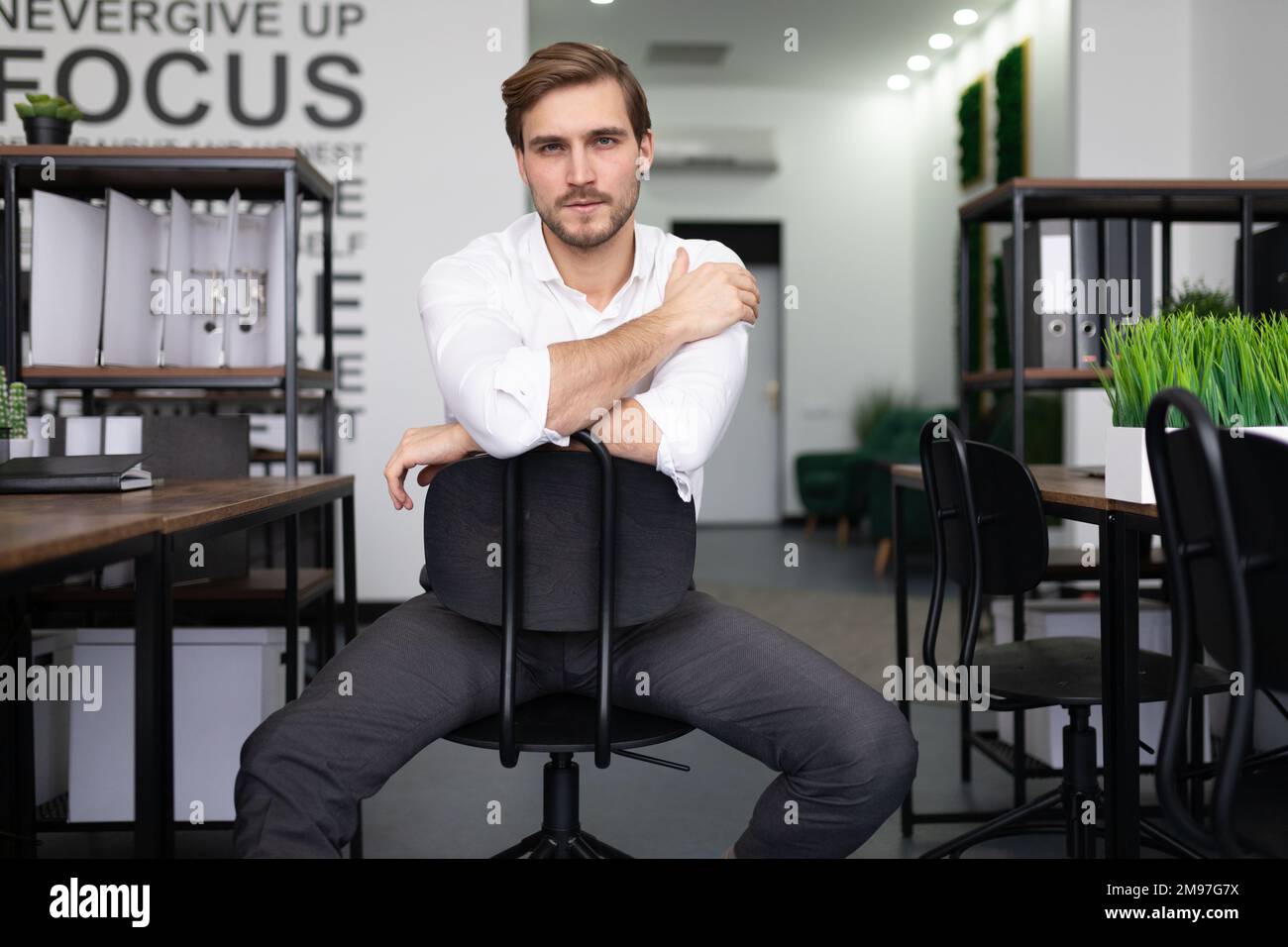 Indian businessman serious chair hi-res stock photography and images ...