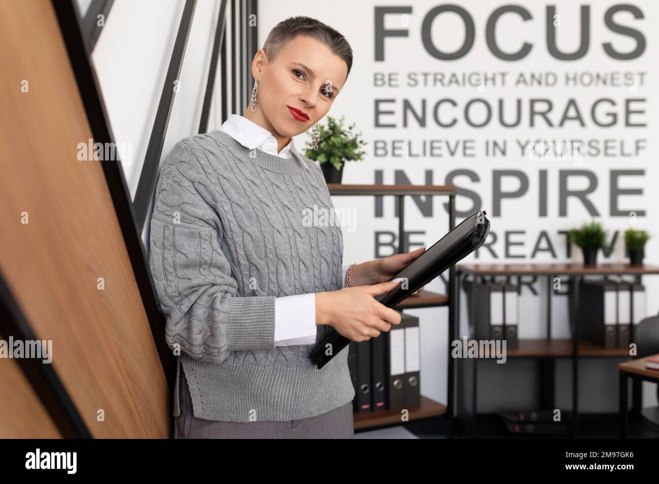 Business woman insurance agent leather folder for documents on office ...