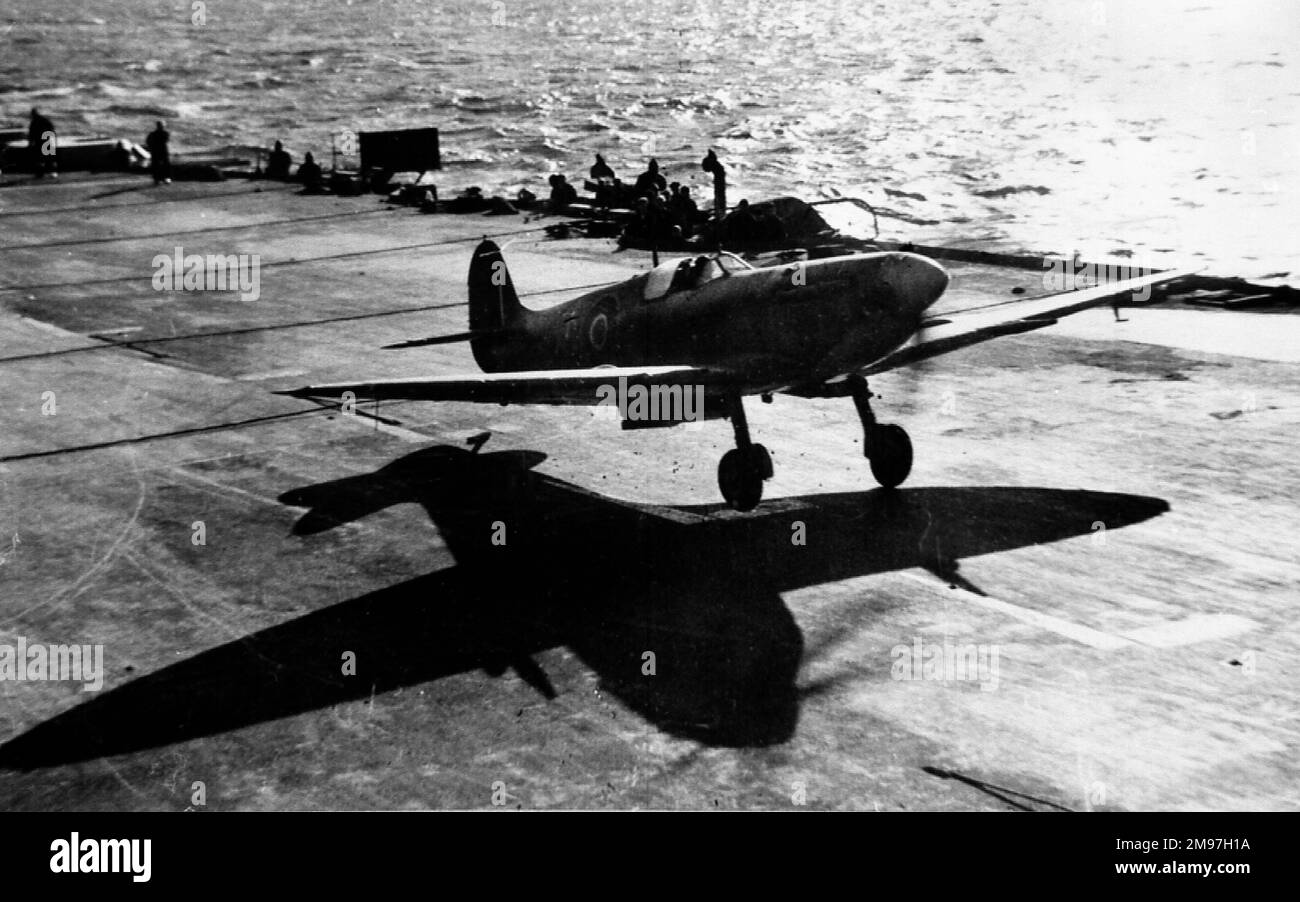 Supermarine Seafire III casting a long shadow on carrier flight deck ...