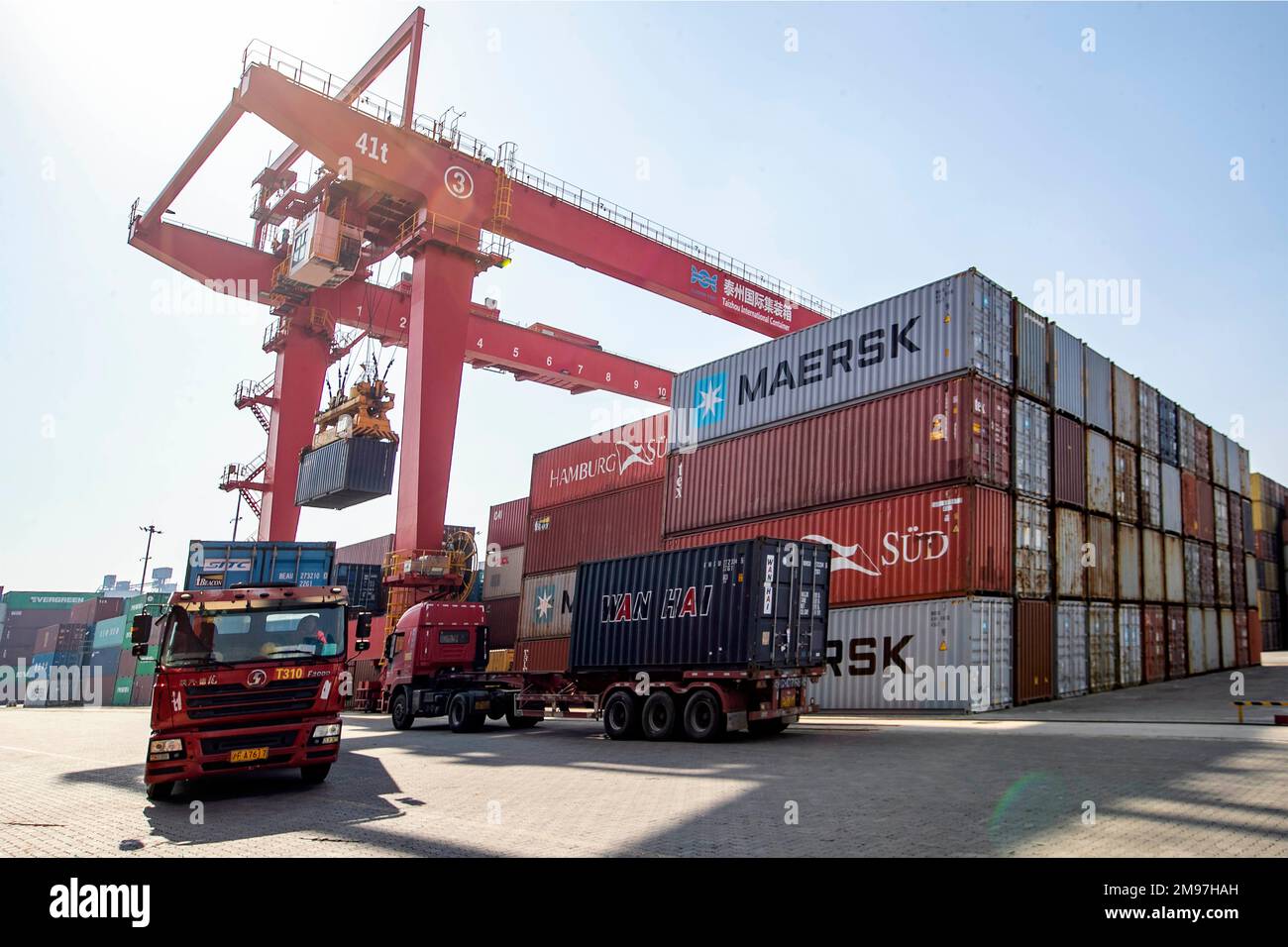Taizhou, China's Jiangsu Province. 17th Jan, 2023. Trucks transport ...