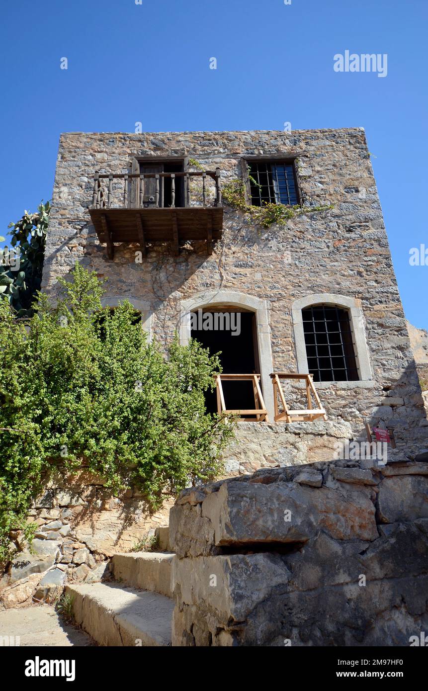 Greece, Crete, home with balcony built of stone in old Venetian ...