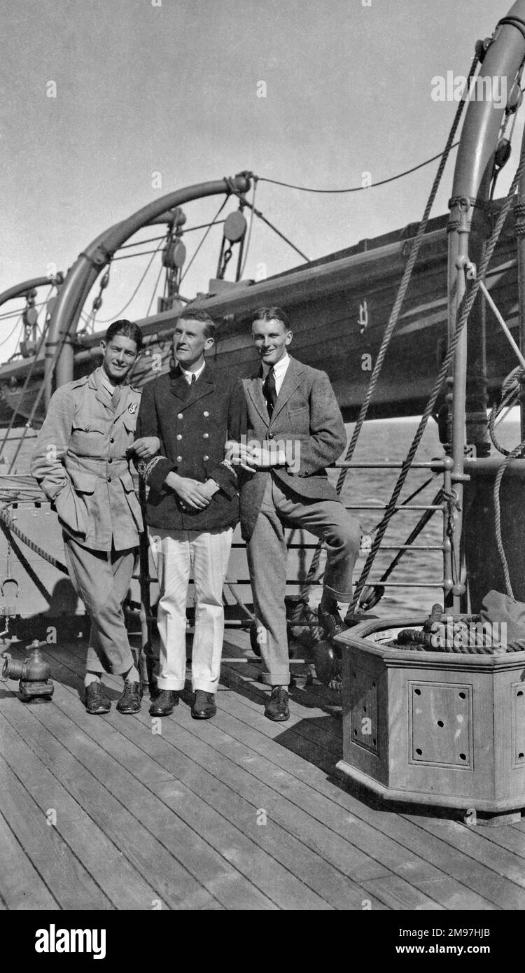 Three men linking arms on the deck of a ship Stock Photo - Alamy