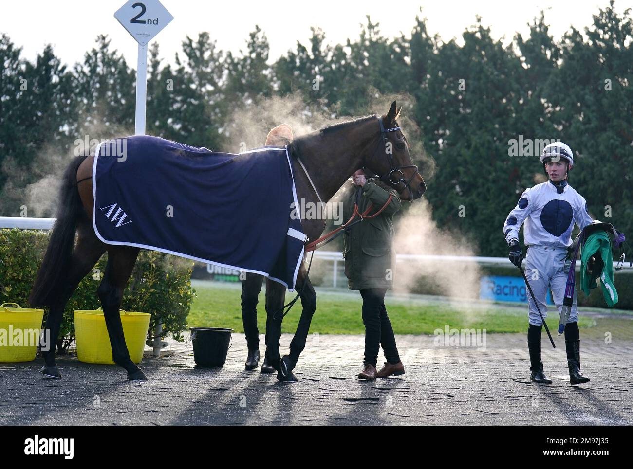 Jockey Taylor Fisher (right) with horse Coral Reef after the bet ...