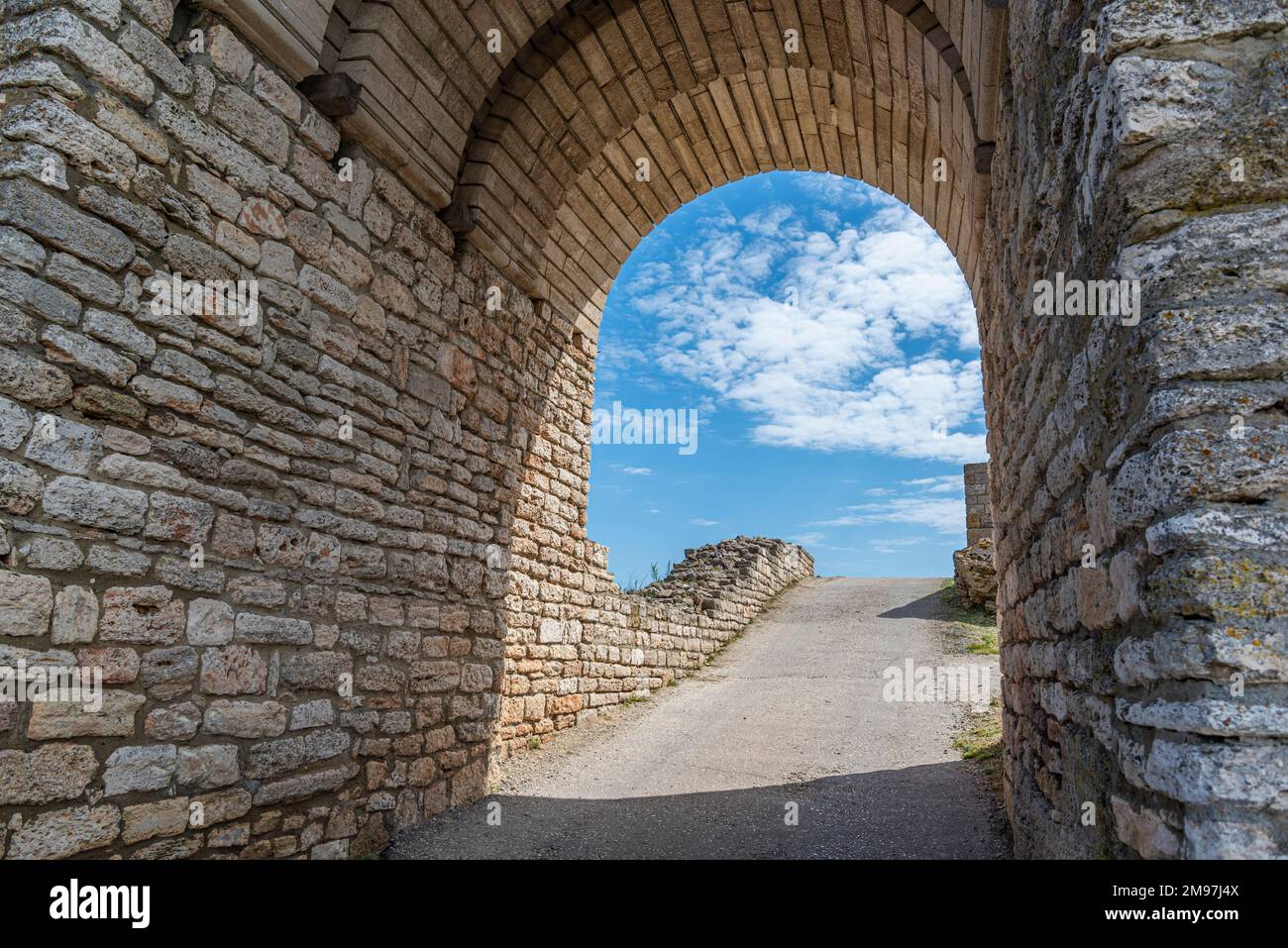 Ancient arch of a medieval wall Stock Photo - Alamy