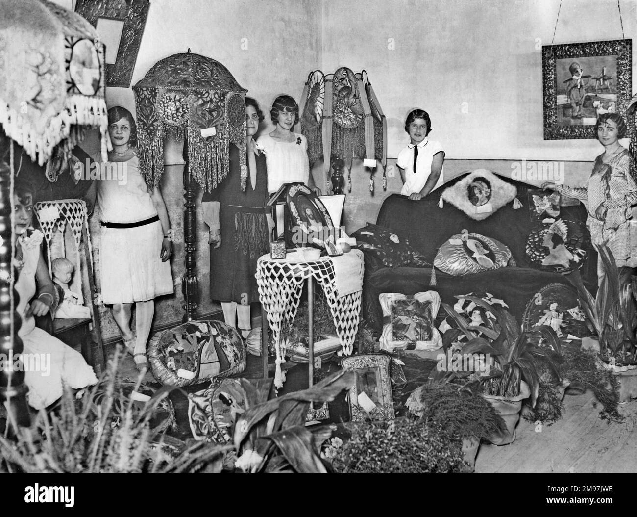 A group of women with a display of homemade arts and crafts Stock Photo ...