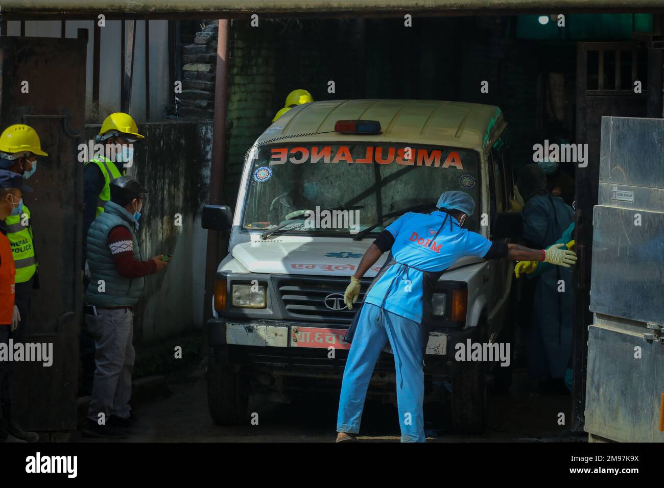 Police personnel prepares for the collection of "Yeti Airplane" crash ...