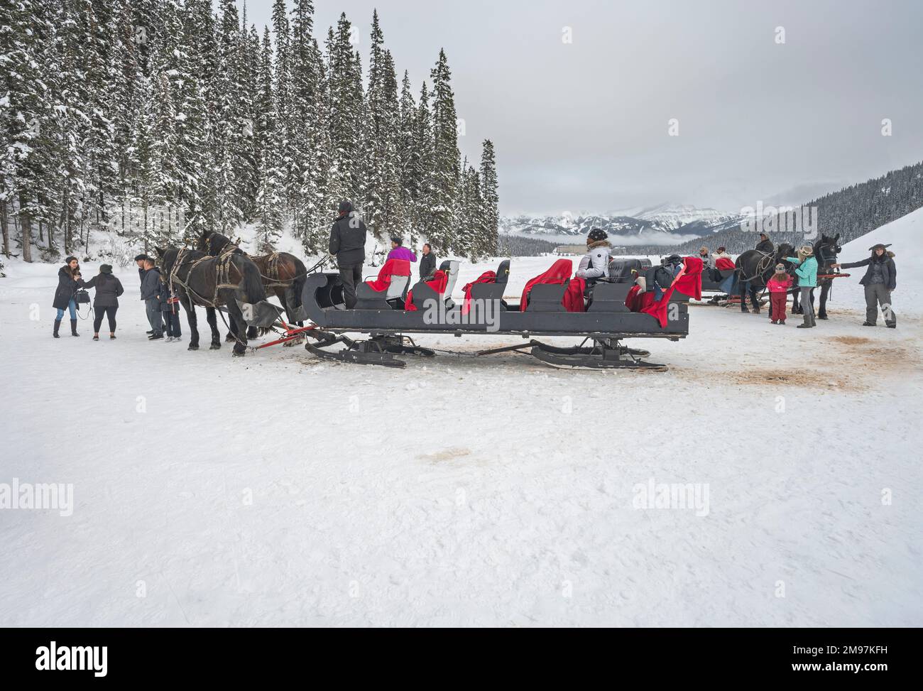 Lake Louise, Alberta, Canada – January 14, 2023: People gather around a ...