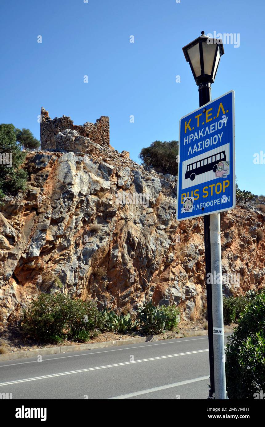 Greece, Crete, bus stop with old Nikithianos Windmill in background ...