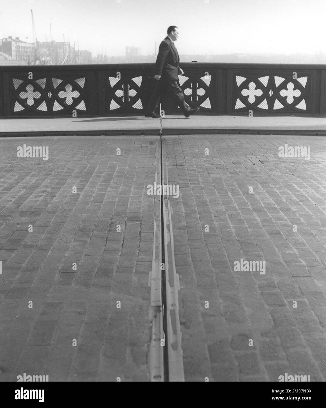 Pedestrian crossing the gap, Tower Bridge, London Stock Photo - Alamy