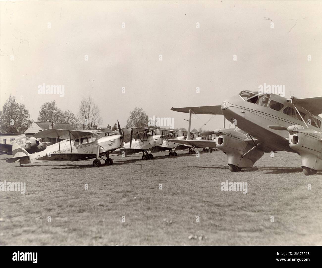 de Havilland DH89 Dragon Rapide, right, and a de Havilland DH87B Hornet ...