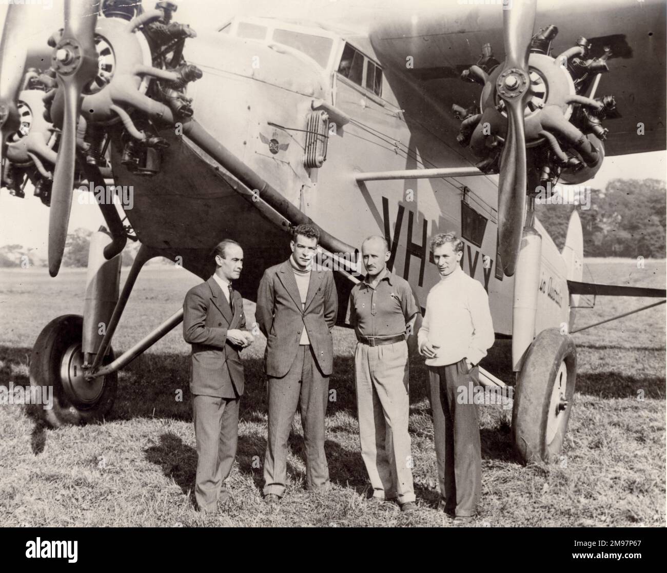 From left: Charles Ulm, P.G. Taylor and crew at Woodford in October ...