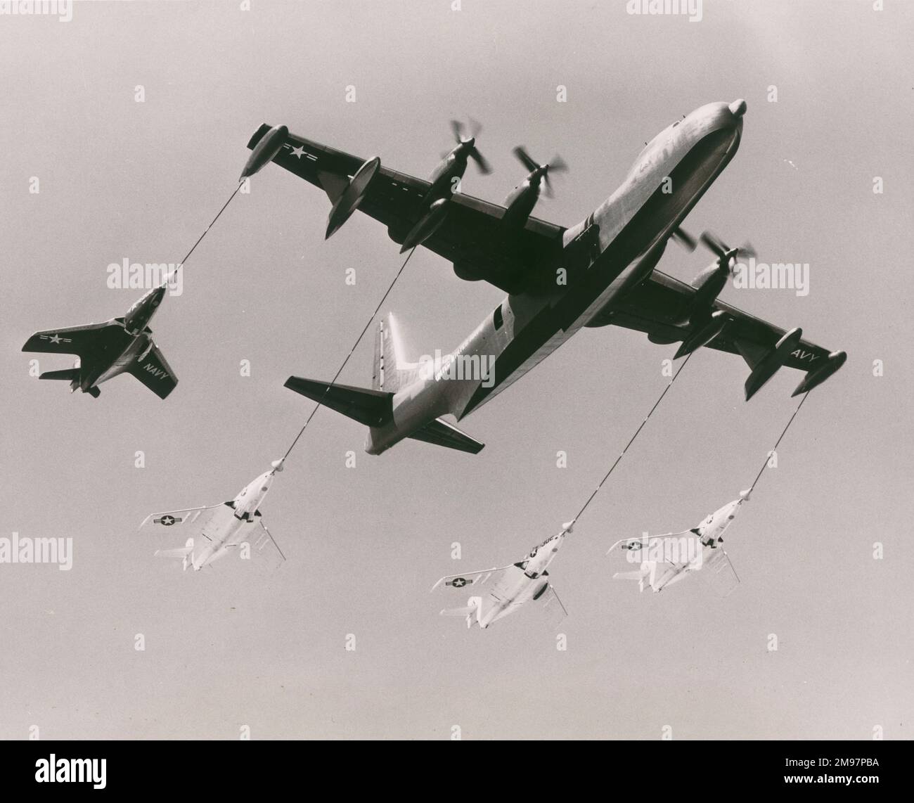 Convair R3Y-2 Tradewind refuelling four Grumman F9F Cougars Stock Photo ...