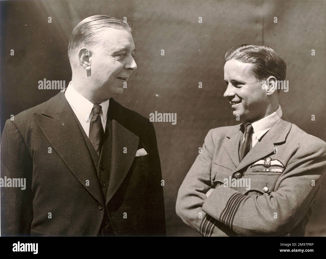 Roy Chadwick, left, and Wg Cdr Guy Gibson following their investiture ...