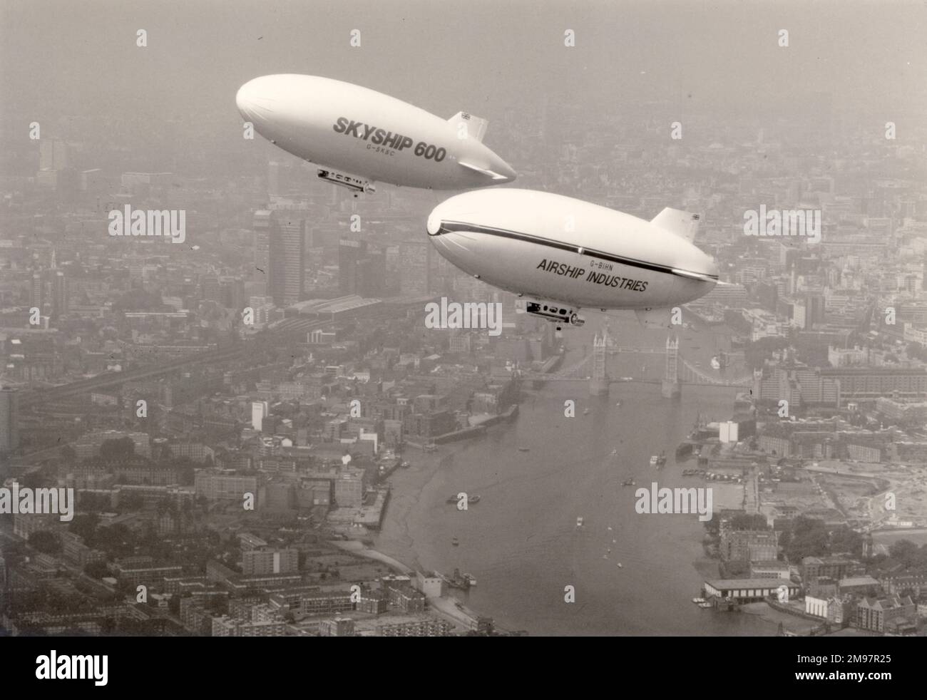 Airship Industries Skyship 500, G-BIHN, and Skyship 600, G-SKSC, over ...
