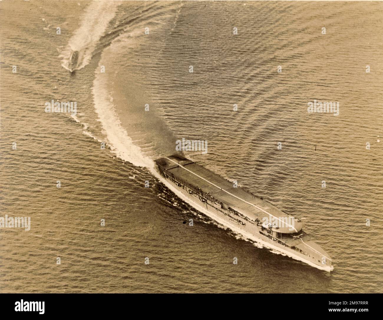 HMS Furious (47) while suffering a hangar fire, c.1928 Stock Photo - Alamy