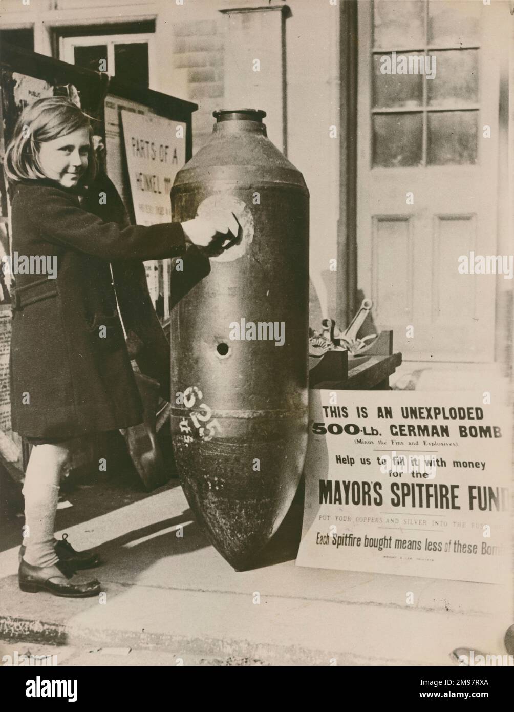 Donating to the mayor’s Spitfire fund using an unexploded German 500lb ...