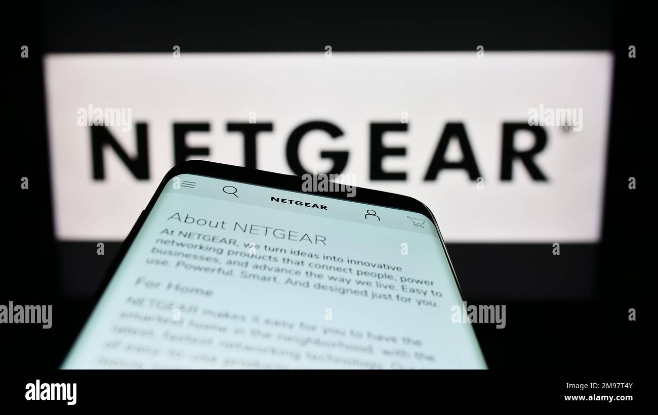 Mobile phone with web page of American computer networking company ...