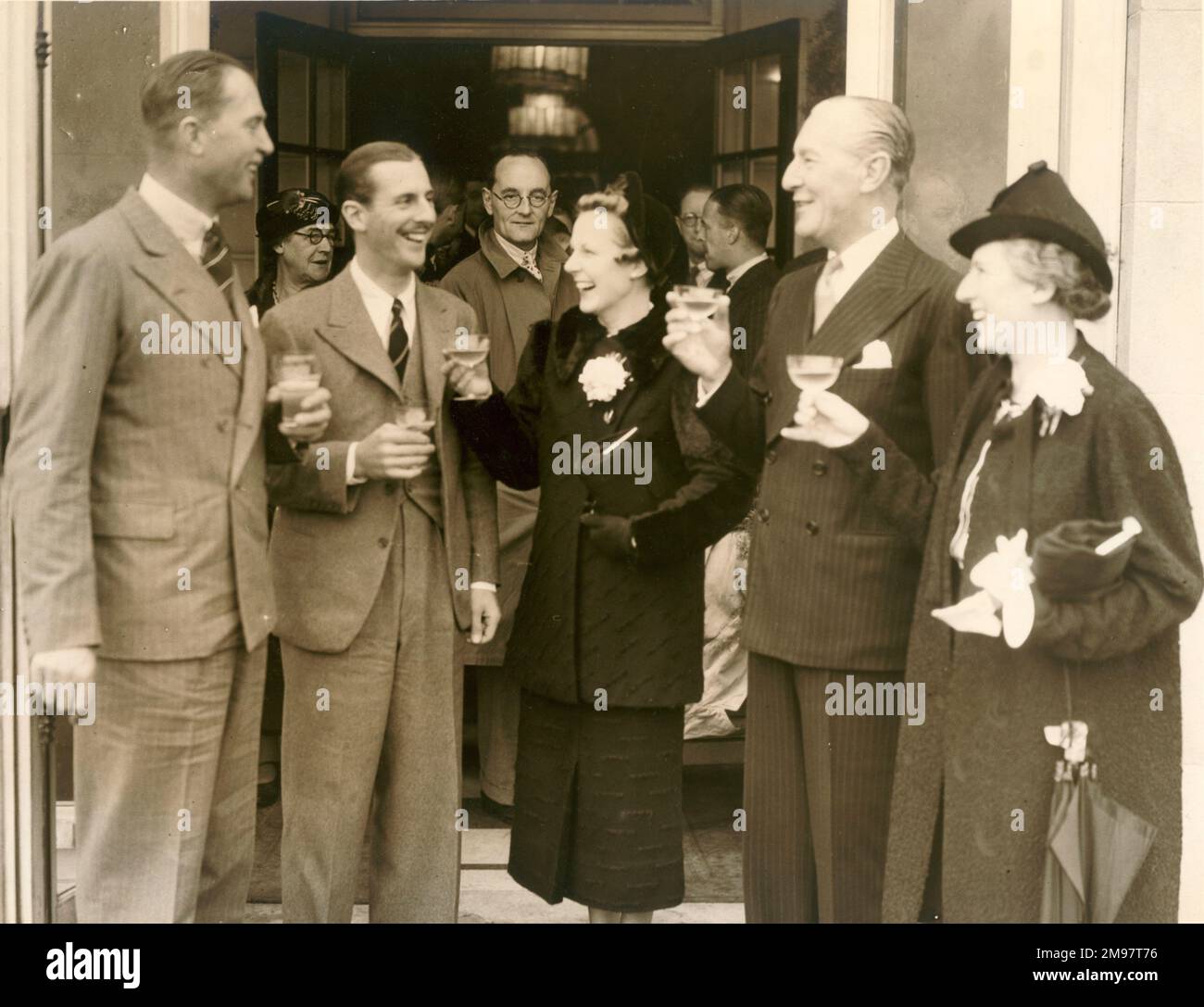 Sir Connop and Lady Guthrie and Mrs Greta Scott toast C.W.A. Scott and ...