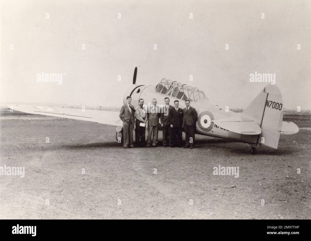 The first North American Harvard I, N7000. From left: H.C. Luttman ...