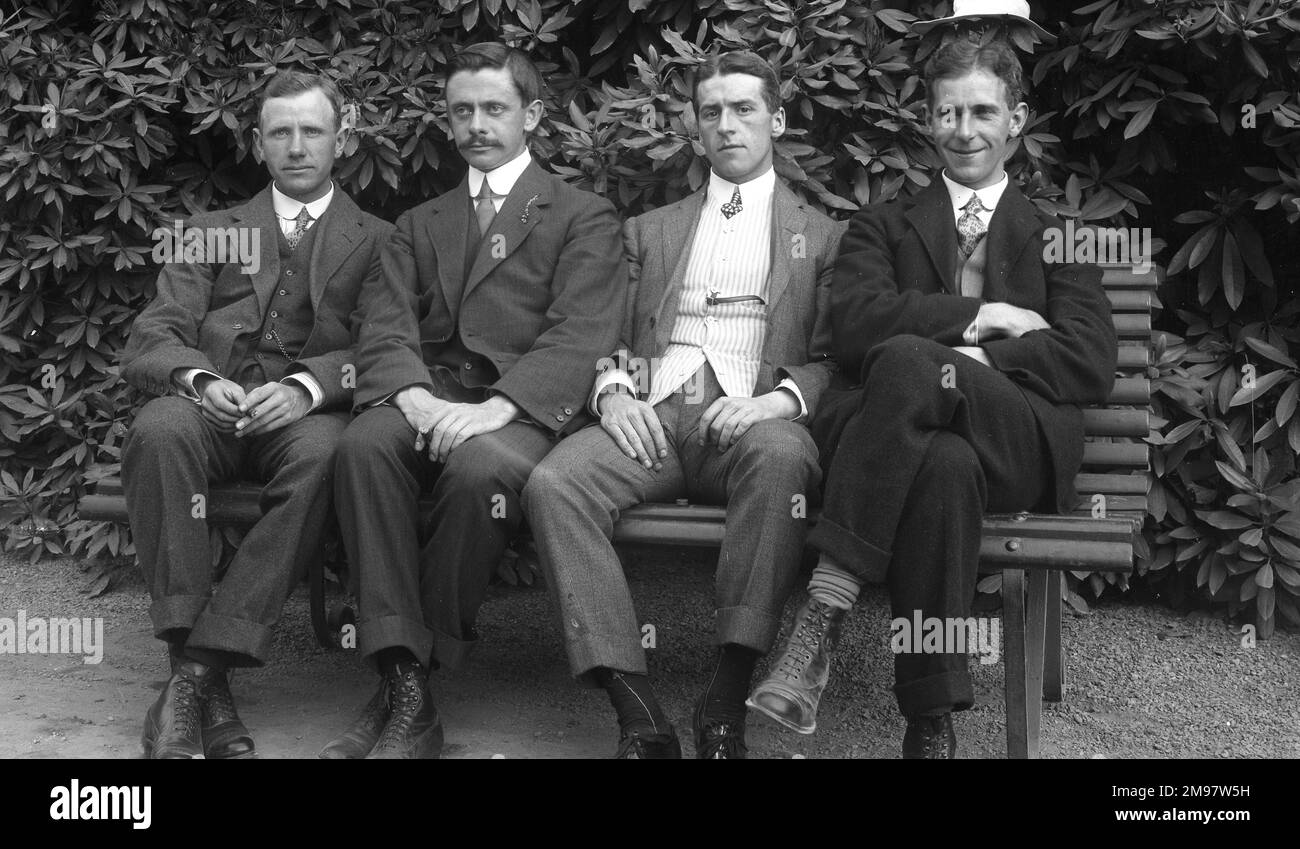 Moffat Hydro grounds - four men on a bench, one of whom has a hat ...