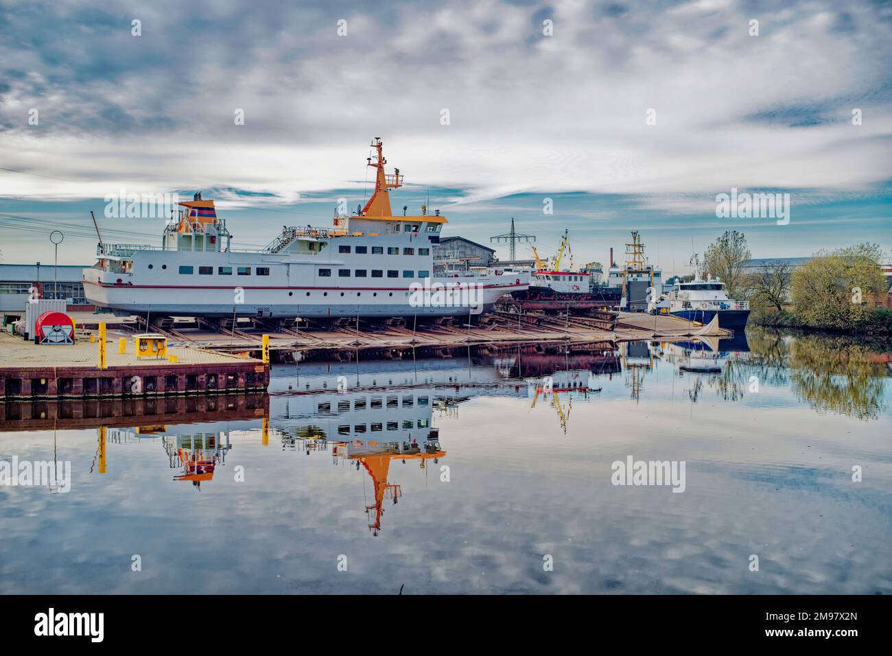 Ships at a shipyard by the river Ems, East Frisia, Lower Saxony ...