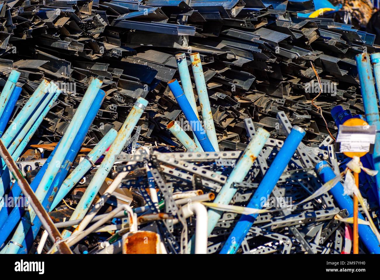 Scrap. Close-up of construction metal waste dump. Pile of pipes and ...