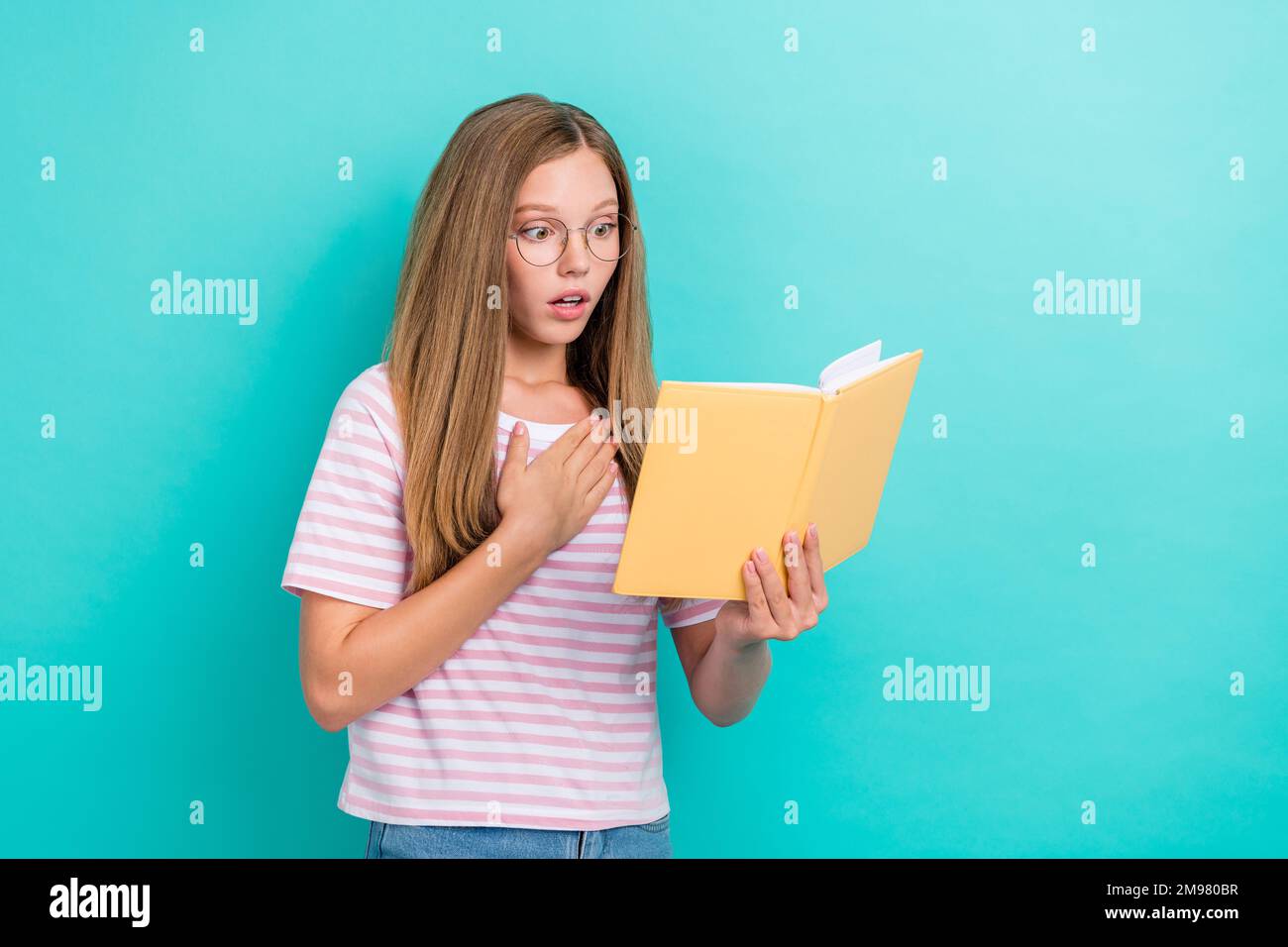 Photo of impressed girl hand touch chest open mouth read fascinated ...