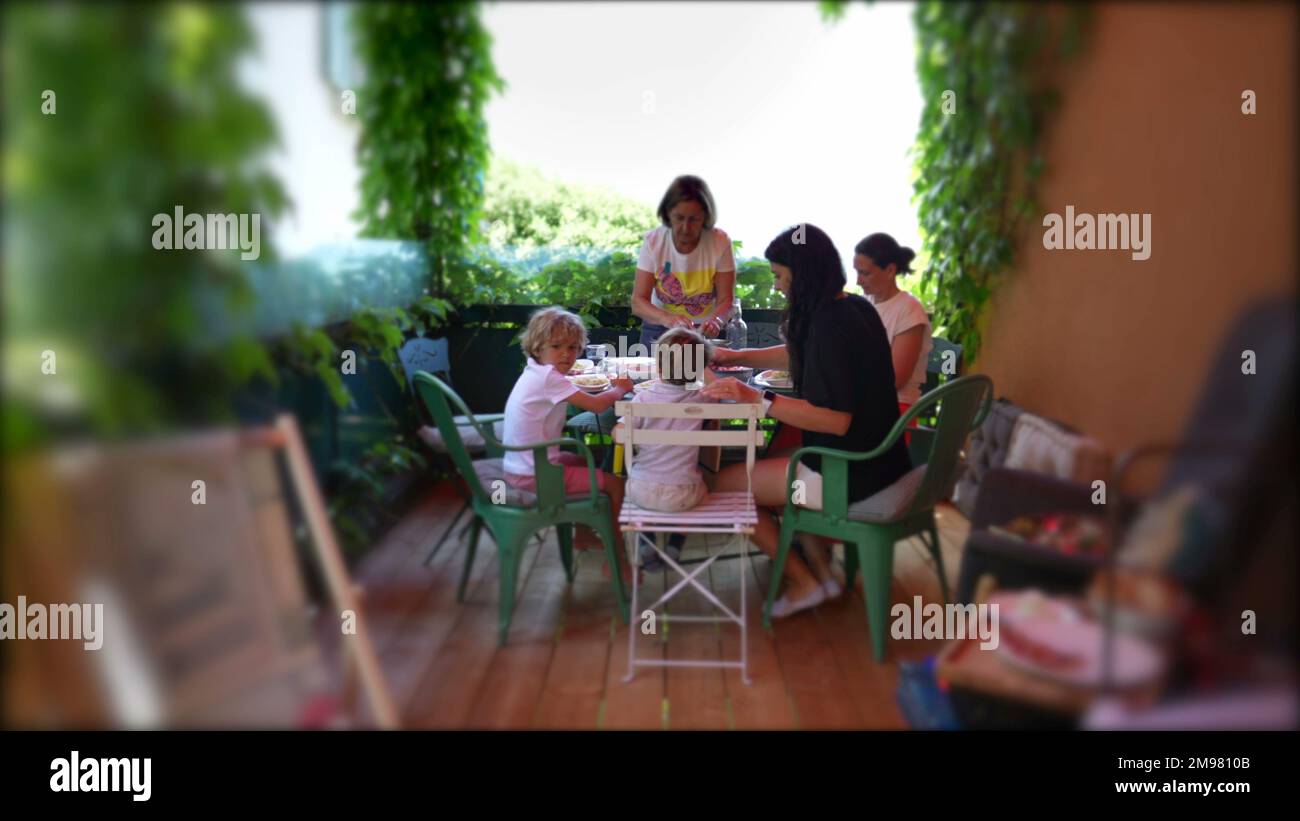 Family eating terrace restaurant hi-res stock photography and images ...