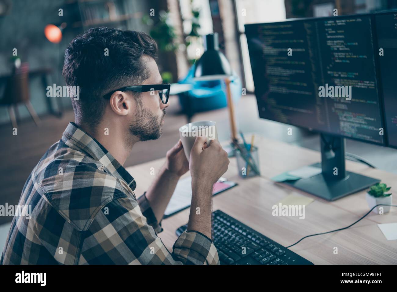 Profile photo of smart professional hardware expert hands hold tea mug ...
