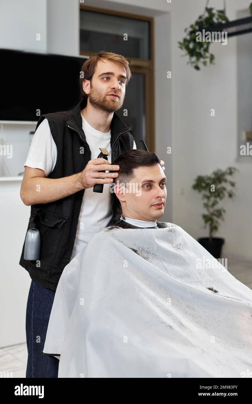 Barber hands shaving beard trimmer hi-res stock photography and images ...