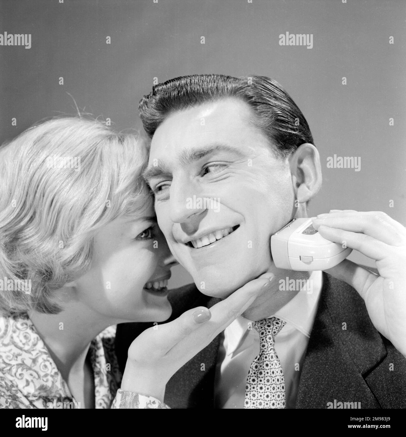 Advertisement for Remington shaver -- male and female models (Sandra ...